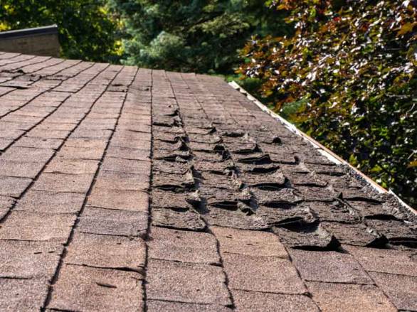 Normal Roof Aging vs. Wear and Tear